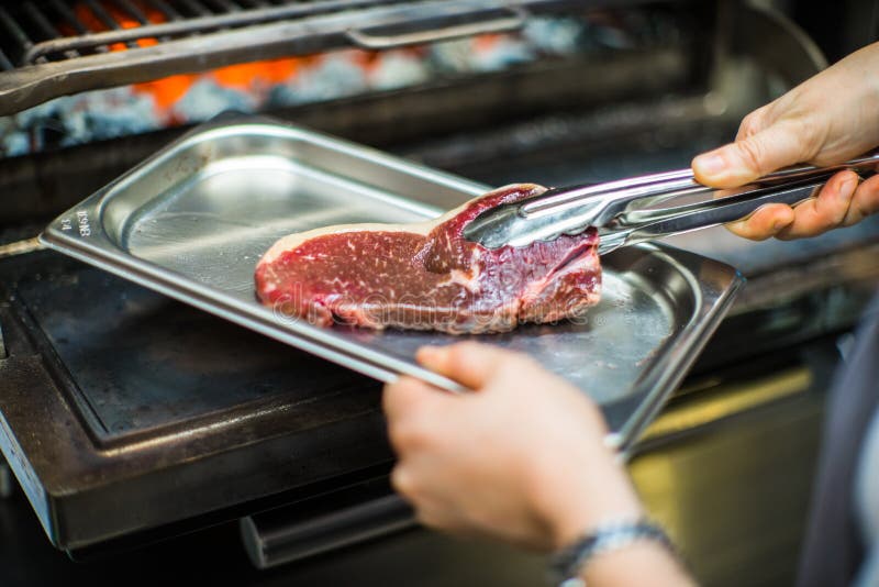 Cooking Beef Steak on a Barbecue Grill. Restaurant, Chef. Open Fire ...