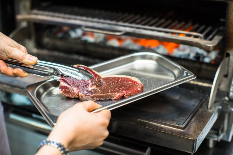 Cooking Beef Steak on a Barbecue Grill. Restaurant, Chef. Open Fire ...