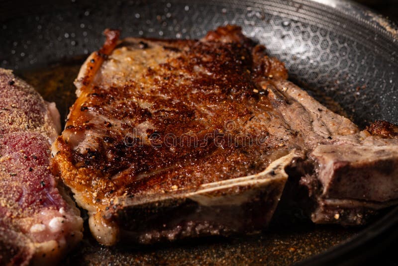 Cooking Beef Steak in Frying Pan Stock Photo - Image of meat, beef ...