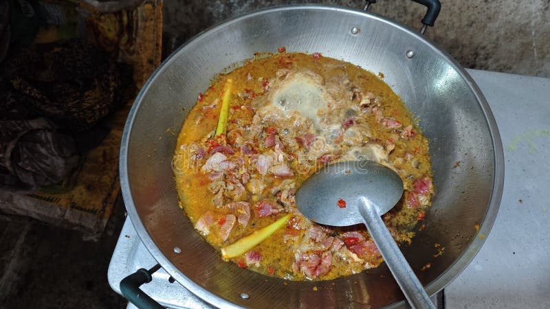 Cooking Beef Stew with Brown Coconut Milk Sauce in a Large Pan Stock ...
