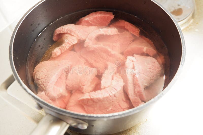 Cooking beef editorial image. Image of buffalo, electric - 197536825