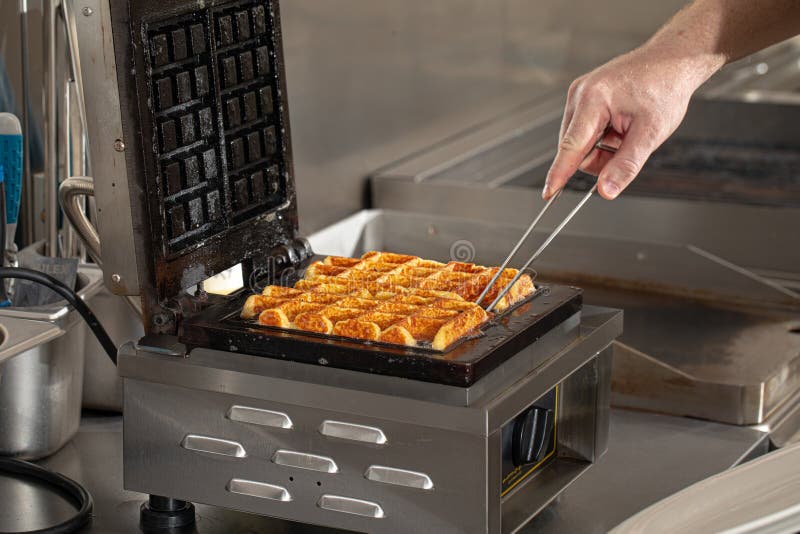 Cooking Belgian Waffles in the Cafe Kitchen Stock Photo - Image of ...