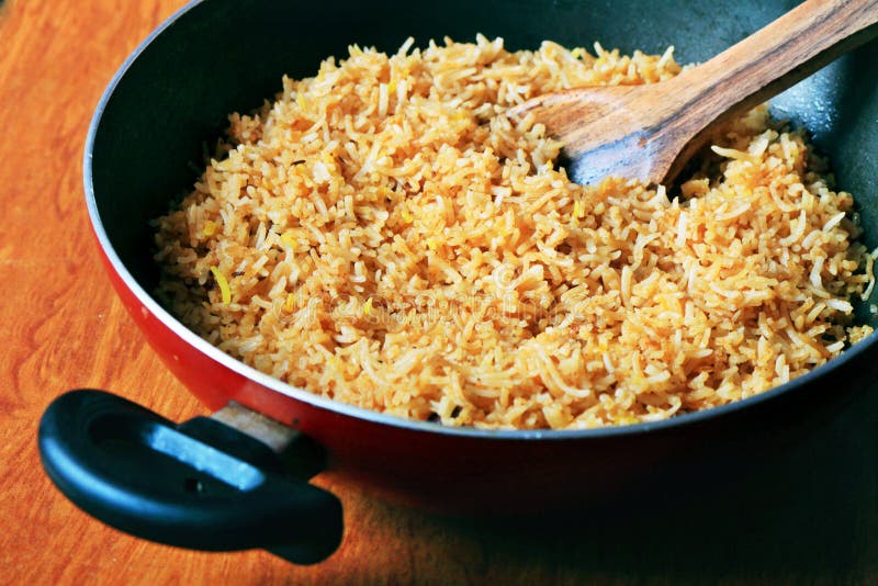 Cooking biryani rice stock image. Image of meal, color - 26379845
