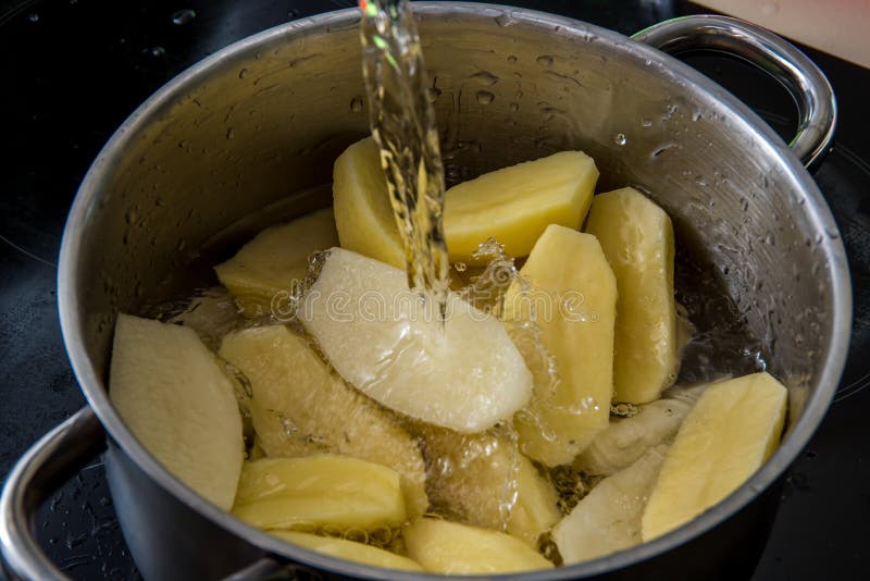 Cooking Boiled Potatoes in the Mashed Potatoes in a Metal Pan Stock ...