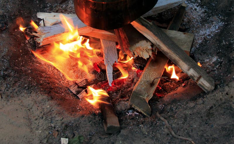 Tourist Cooking Food On Bonfire, Cooking On Snow In Winter. Preparation ...