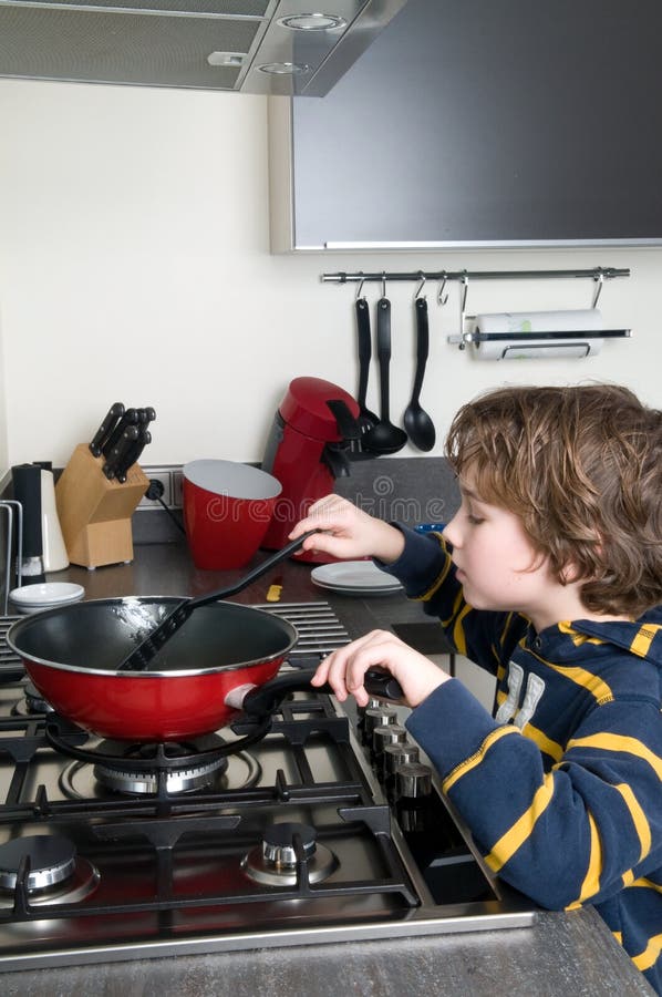 Cooking Boy stock image. Image of stirring, contemporary - 18150955