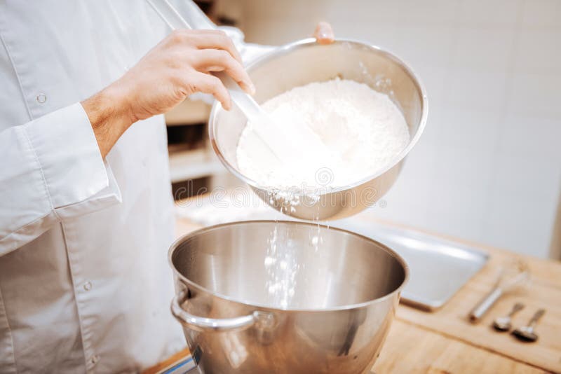 Baker in Uniform Adding Some Flour while Cooking Bread Stock Image ...