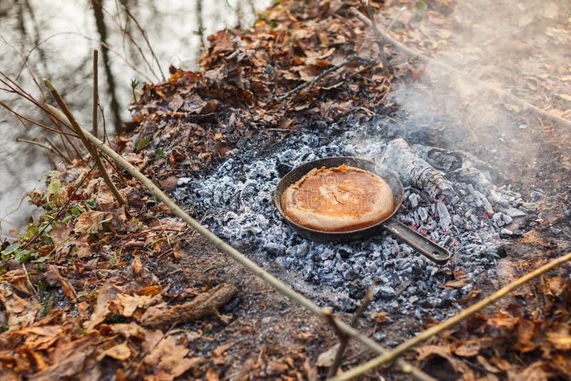 Cooking Bread on Fire Coals in the Evening Stock Photo - Image of ...