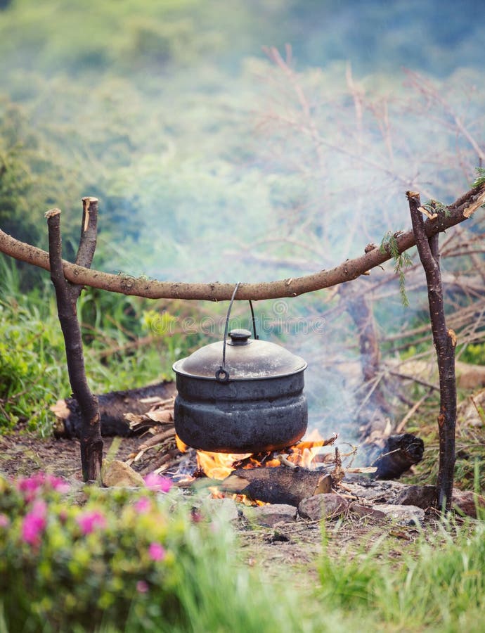 Cooking Breakfast on Fire in Mountains Stock Photo - Image of ...