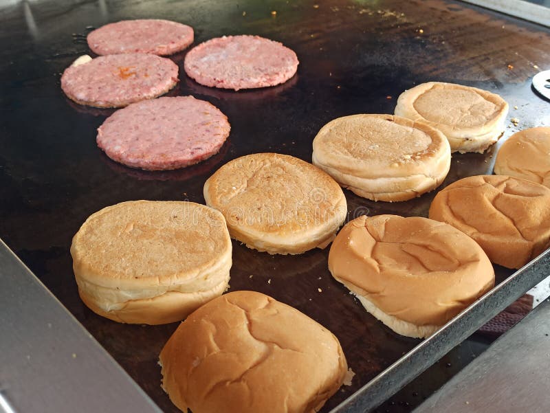 Cooking burger on pan stock image. Image of breakfast - 230579891