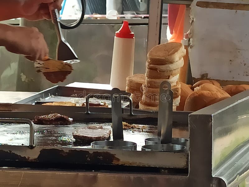 Cooking burger at stall stock image. Image of meal, dessert - 230580549