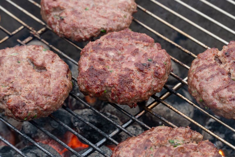 Cooking Burgers on Hot Grill Stock Photo - Image of meal, cook: 182611360