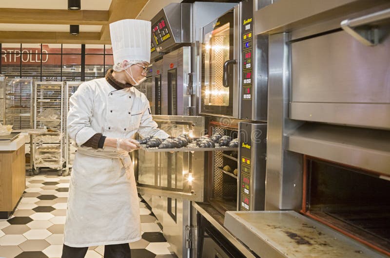 Cooking cake editorial stock photo. Image of putting - 85313748