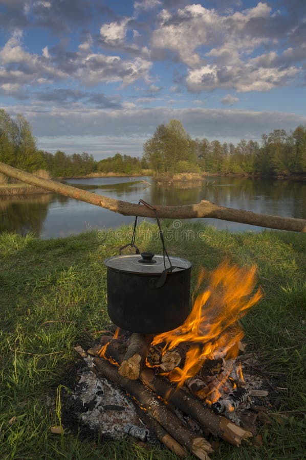 Black pot over fire stock image. Image of lifestyle - 110008117