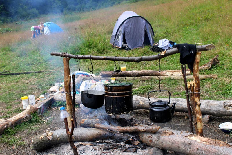 Rustic Old Village With Campfire Stock Photo - Image of ancient, cabin ...