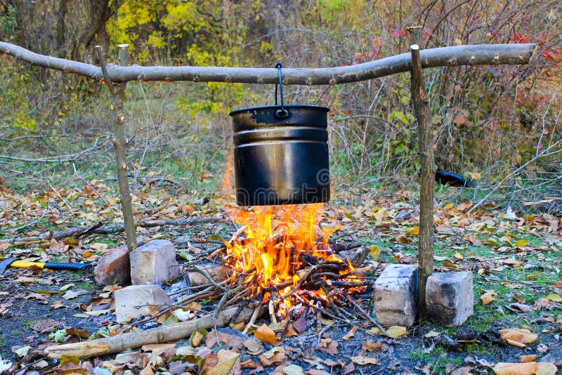 Cooking on Campfire in Camping Stock Photo - Image of cook, flame ...