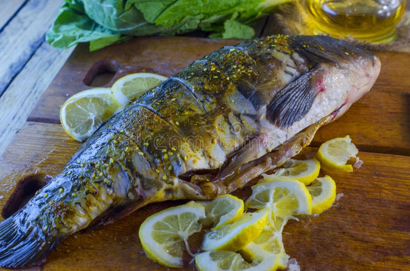 Cooking Carp Fish with Lemon Stock Image - Image of cutting, protein ...