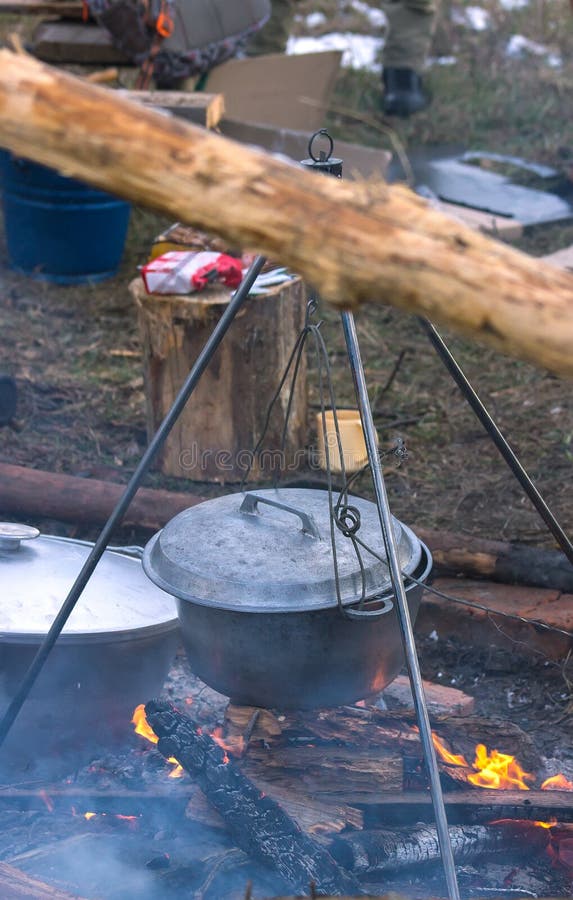 Cooking in Cauldron on Campfire at Forest Stock Image - Image of ...