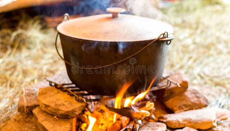 Cooking in a Cauldron on Fire Stock Image - Image of travel, camping ...
