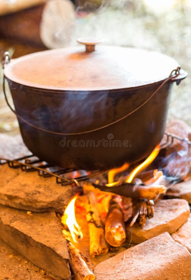 Cooking in a Cauldron on Fire Stock Photo - Image of traditional, camp ...