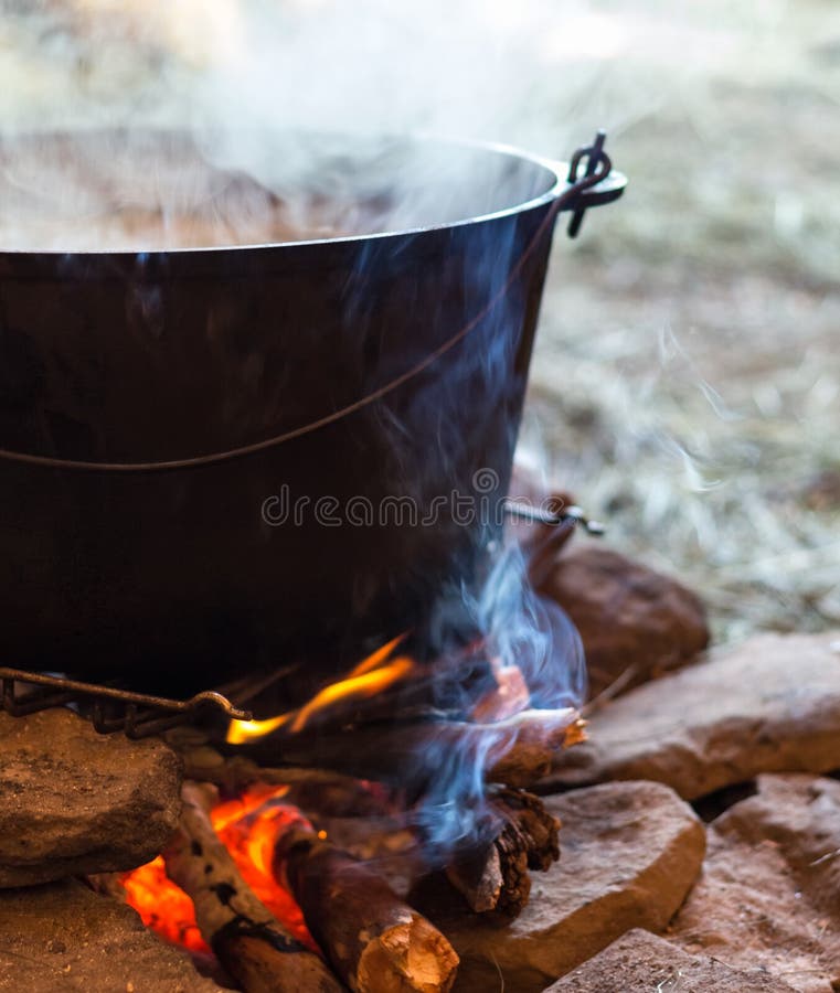 Cooking in a Cauldron on Fire Stock Image - Image of soup, meal: 310341717