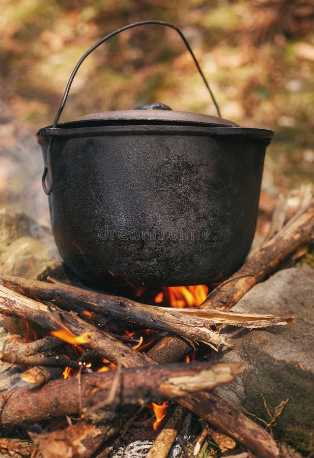 Cooking in the Cauldron on the Open Fire. Stock Photo - Image of metal ...