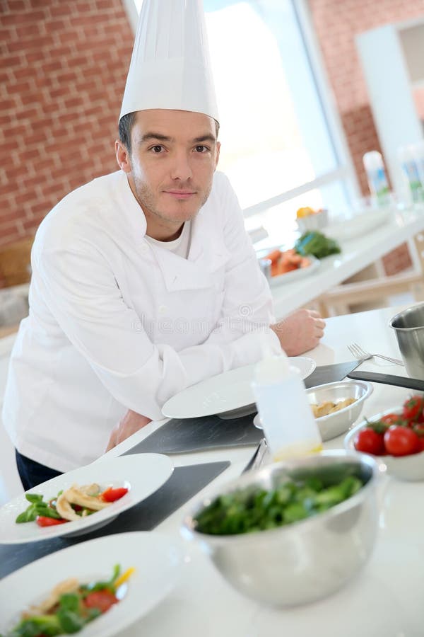 Cooking chef in kitchen stock image. Image of cooking - 51285175