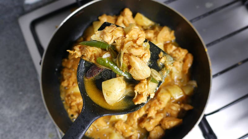 Cooking Chicken Curry in a Cooking Pan Stock Footage - Video of water ...