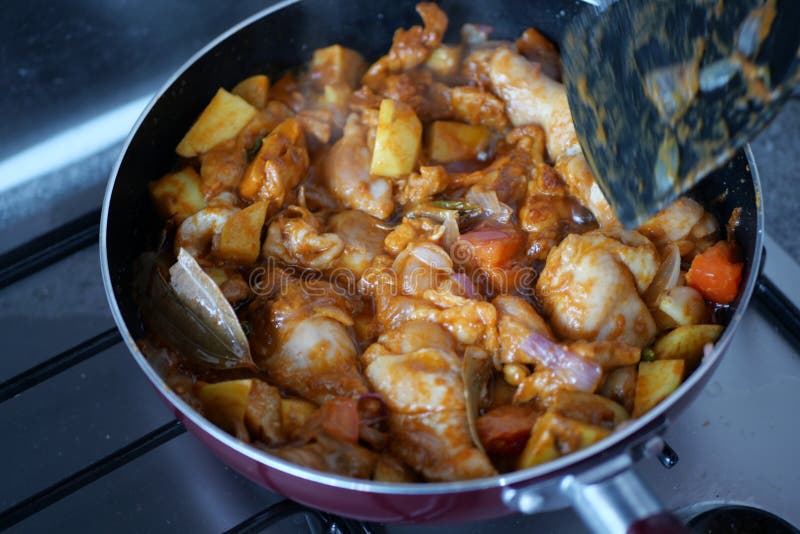 Cooking Chicken Curry in a Cooking Pan Stock Photo - Image of spicy ...