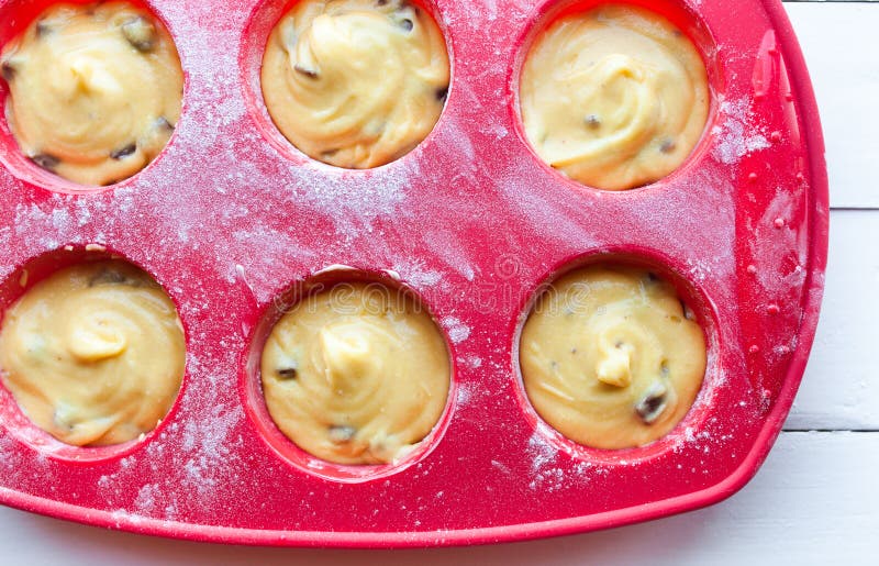 Cooking Chocolate and Vanilla Muffins on Table Stock Image - Image of ...