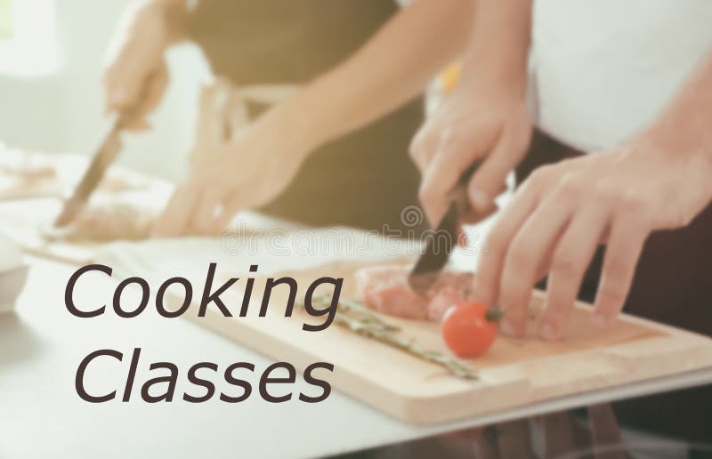 Cooking Classes. Blurred View of Man Cutting Meat on Wooden Board at ...