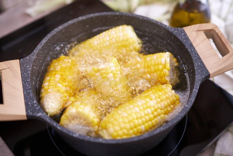 Cooking Corn Cob in a Pot of Boiling Water with Bubbles Stock Photo ...