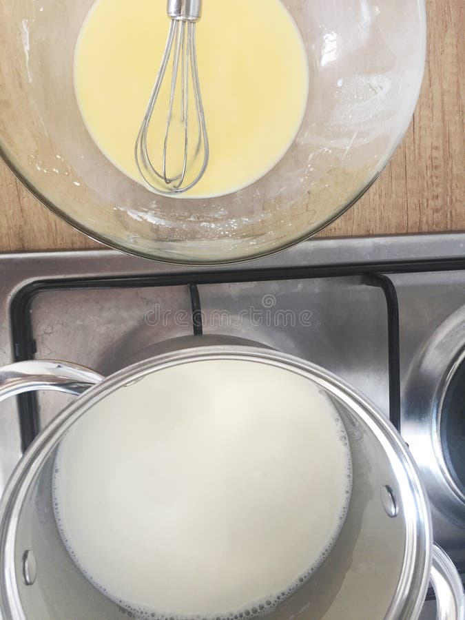 Cooking Cream in the Kitchen Stock Image - Image of metal, sautacopy ...