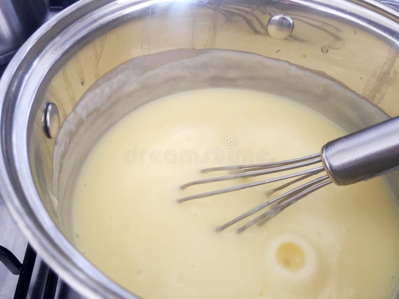Cooking Cream in the Kitchen Stock Image - Image of metal, sautacopy ...