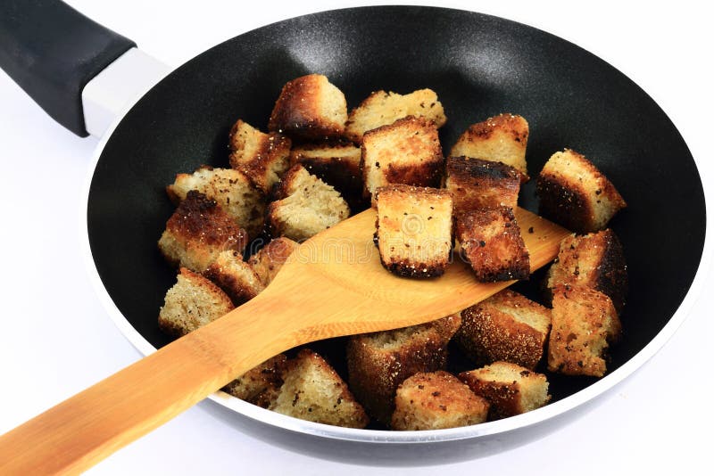 Cooking Croutons. stock image. Image of croutons, spoon - 26038499