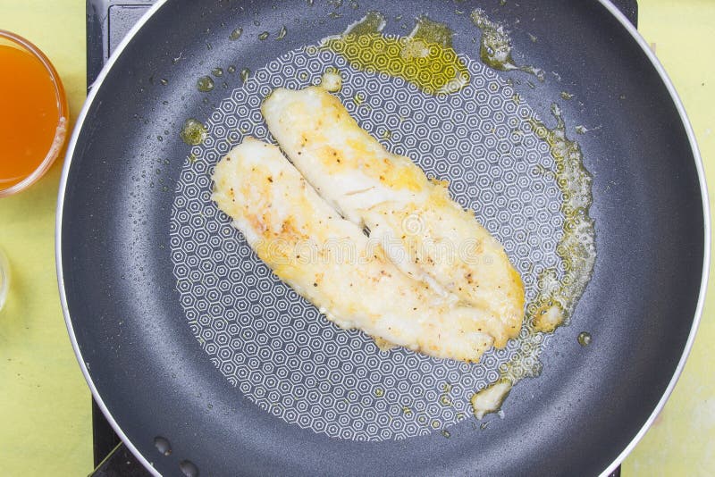 Cooking dory fish Steak stock photo. Image of iron, closeup - 74235230