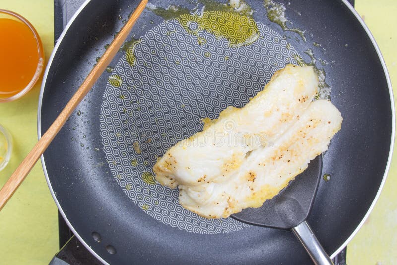 Cooking dory fish Steak stock photo. Image of pepper - 75360974