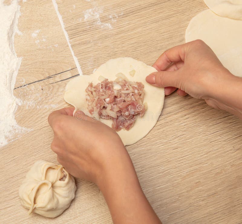 Cooking Dough with Meat on the Table. Stock Image - Image of hand ...