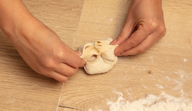 Cooking Dough with Meat on the Table. Stock Photo - Image of asia, hand ...