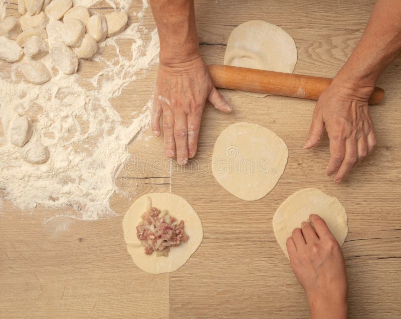 Cooking Dough with Meat on the Table. Stock Photo - Image of dumpling ...