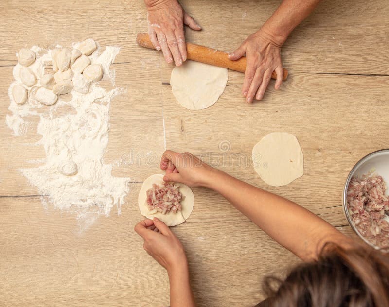 Cooking Dough with Meat on the Table. Stock Photo - Image of table ...