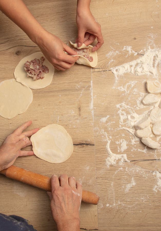 Cooking Dough with Meat on the Table. Stock Image - Image of table ...