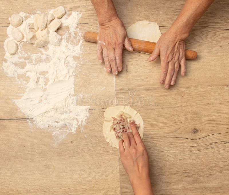 Cooking Dough with Meat on the Table. Stock Image - Image of cooking ...