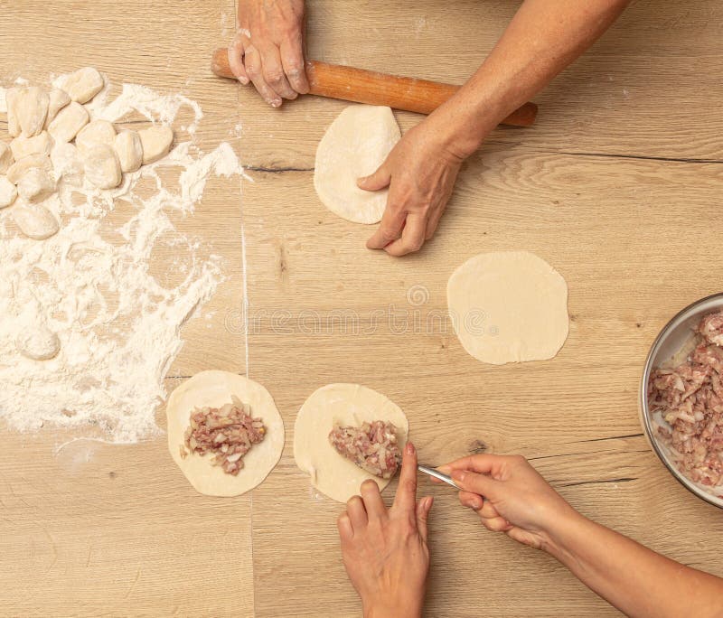 Cooking Dough with Meat on the Table. Stock Photo - Image of table ...
