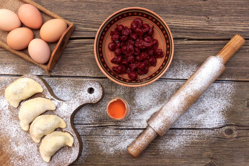 Cooking Dough Pies on a Dough Board Stock Photo - Image of cooking ...