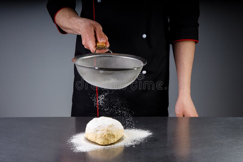 Cooking Dough Sprinkling Flour in a Restaurant Kitchen1 Stock Image ...
