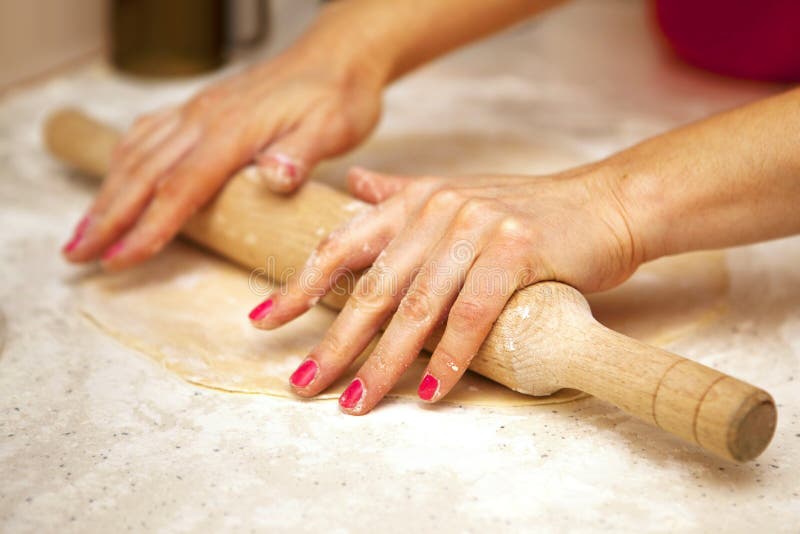 Hands with rolling pin stock photo. Image of cookery - 109779652
