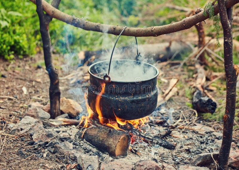 Cooking in Field Conditions, Boiling Pot at the Campfire Stock Photo ...