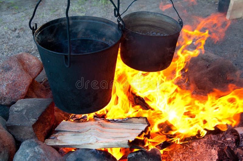 Cooking on fire stock image. Image of holiday, stone - 23020927