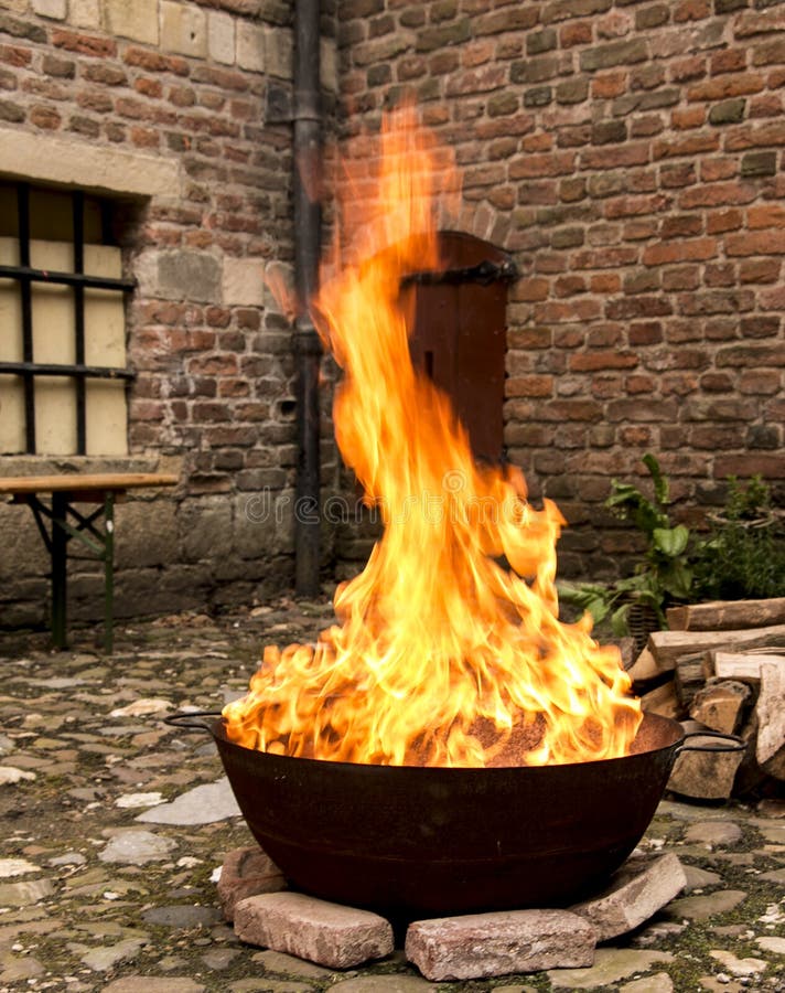 Cooking Fire at a Castle in a Kettle Stock Photo - Image of cooking ...